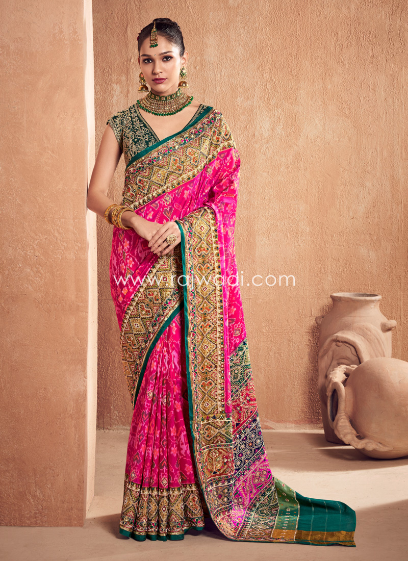 Rani And Green Embroidered Patola Silk Saree